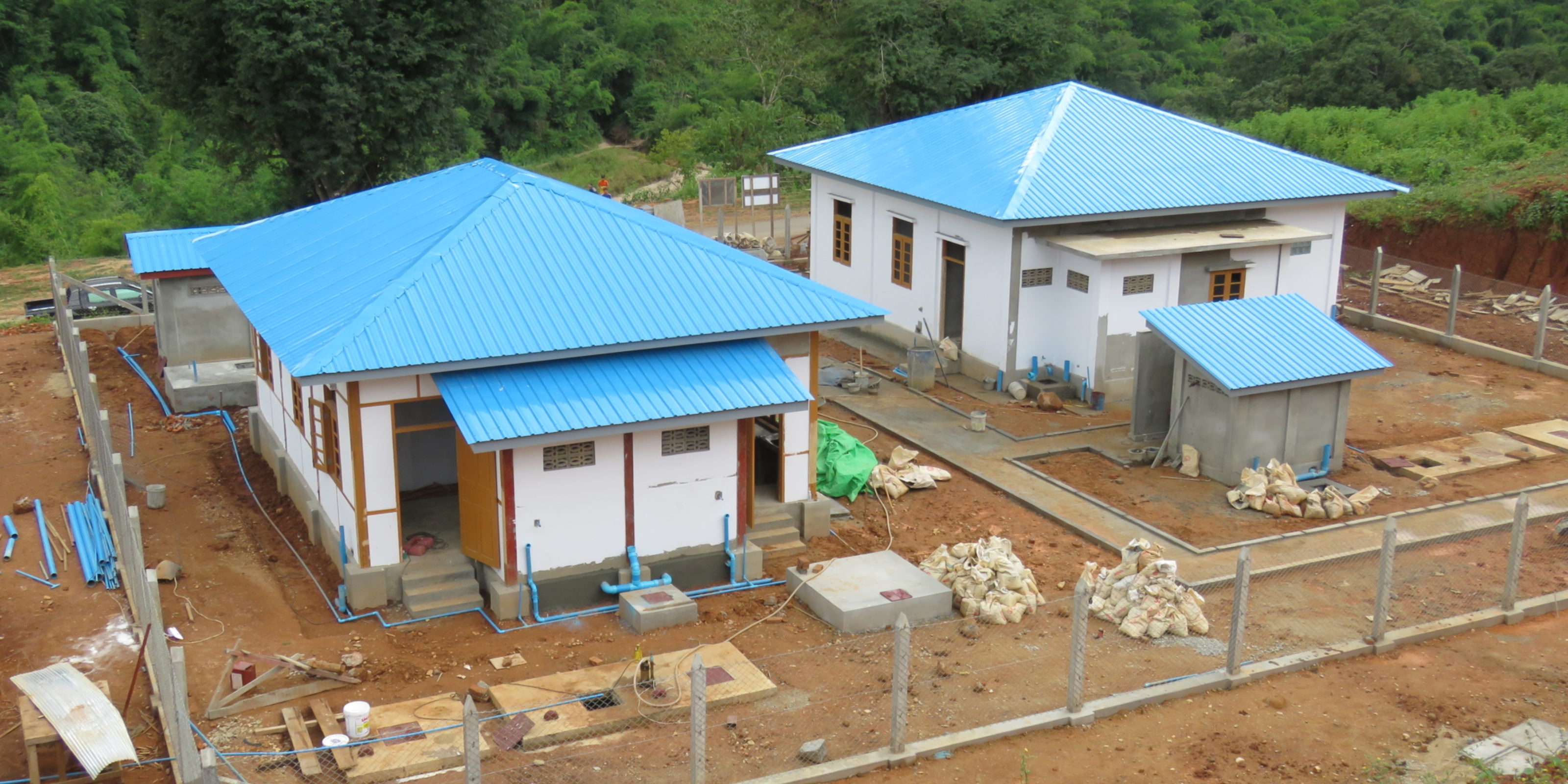 Roads, health centres and water pumps – changing lives in… | UNOPS